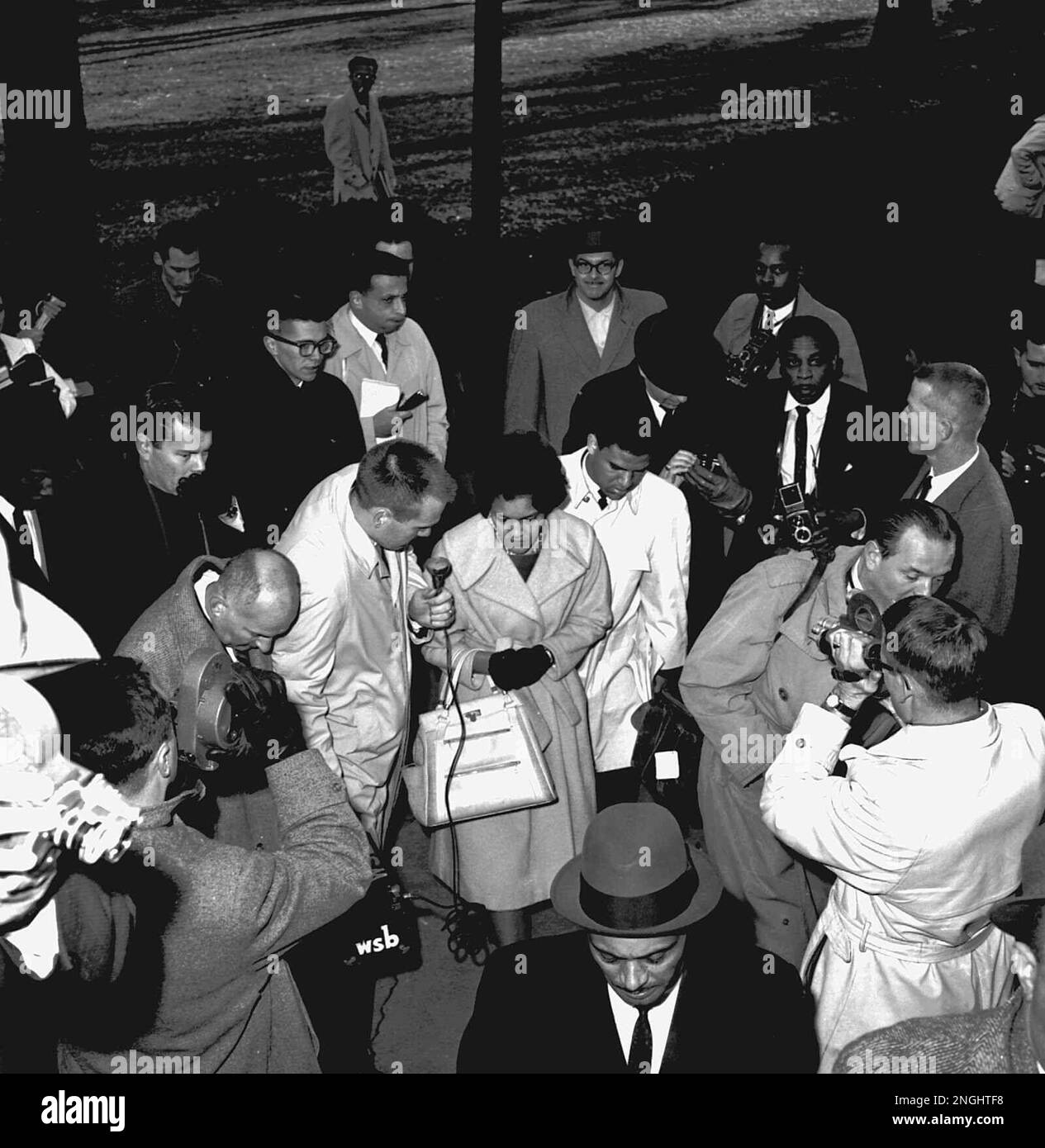 Charlayne Hunter, 18, and Hamilton Holmes, 19, center, have both been ...