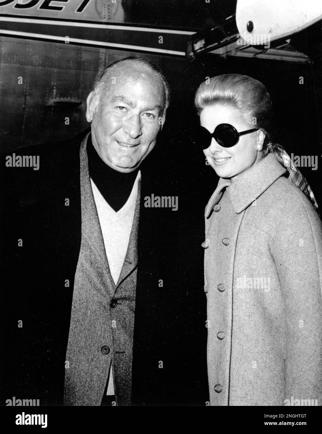 Movie producer Hal Wallis and his wife and actress Martha Hyer pose at ...