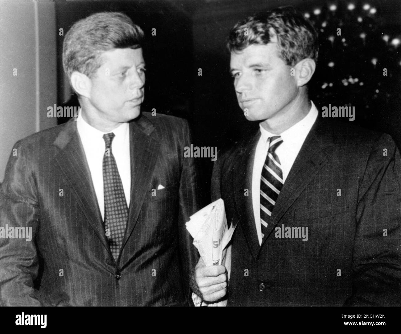 Massachusetts Sen. John F. Kennedy, left, discusses campaign matters ...