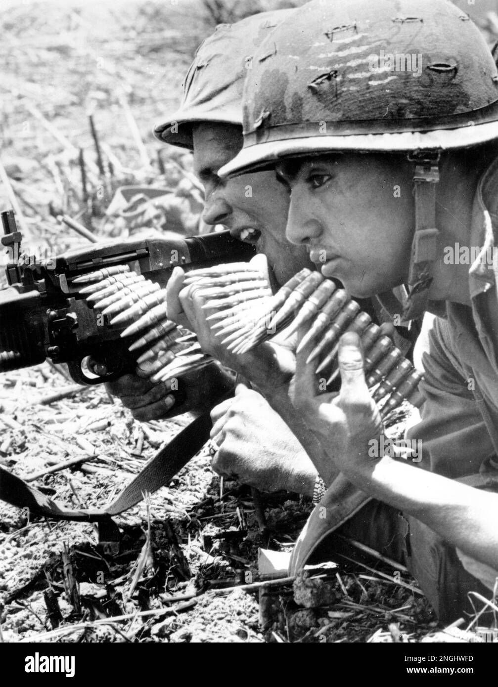 Members of the 2nd Battalion, 3rd U.S. Marines fire their M60 machine ...