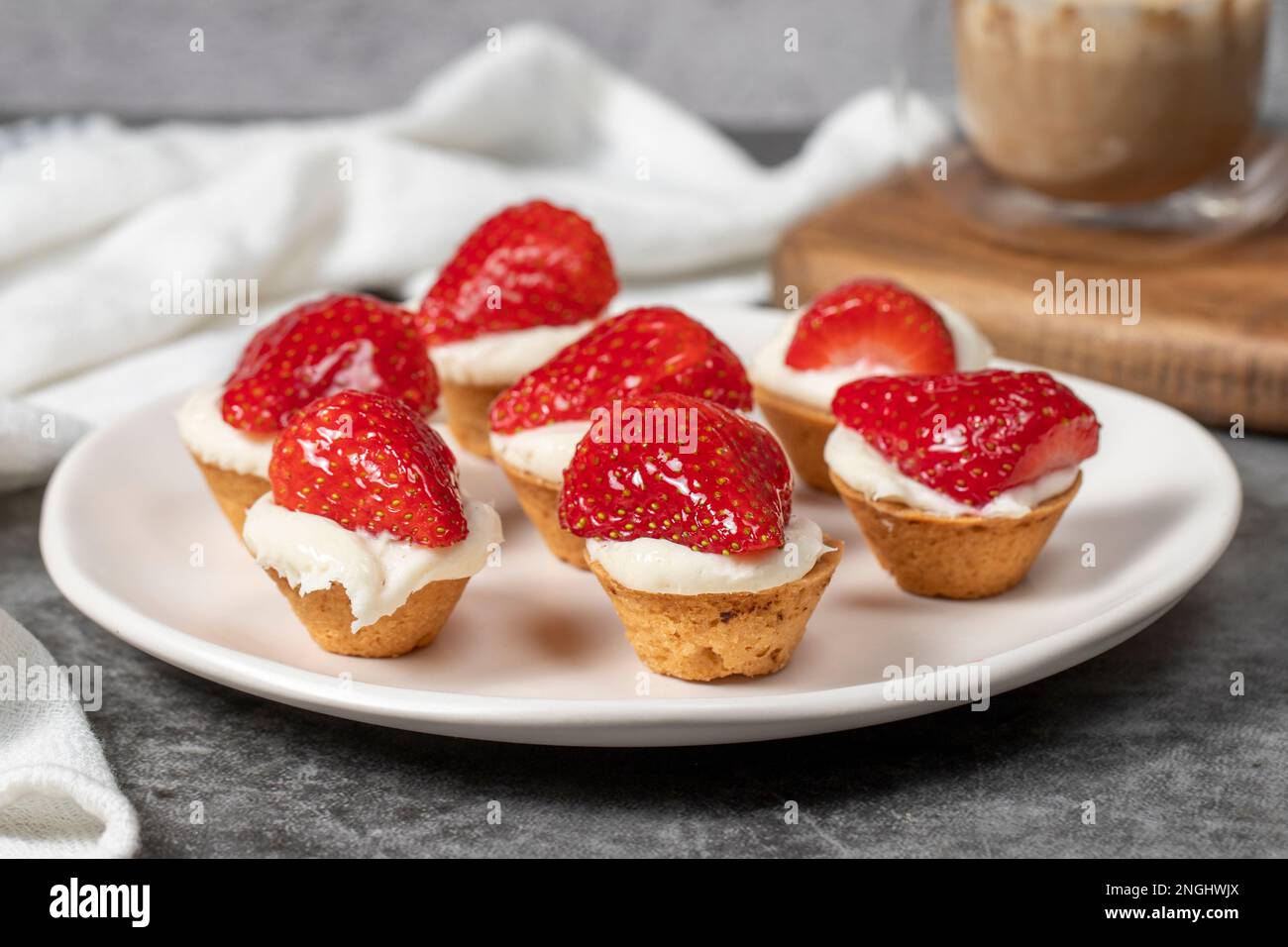 Strawberry tartlet. Delicious tartlet dessert on plate. close up Stock ...