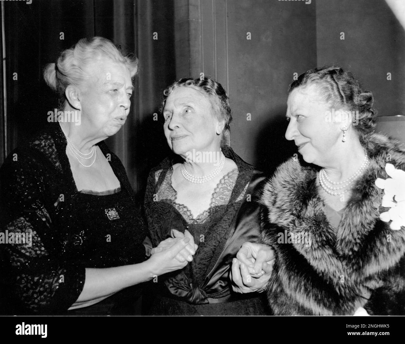 Eleanor Roosevelt talks with writer Helen Keller, center, at the ...
