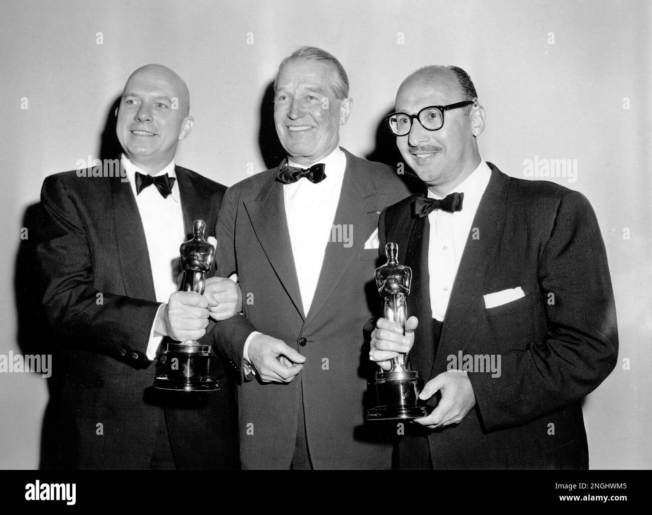 Musicians Jimmy Van Heusen, left, and Sammy Cahn, right, hold their ...