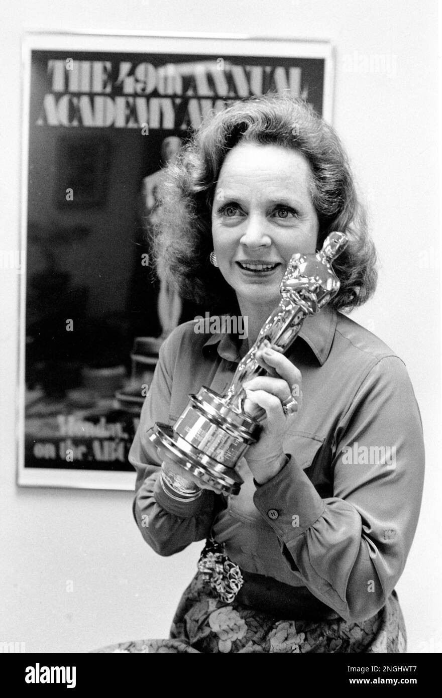 Actress Beatrice Straight displays her Oscar statuette during an ...