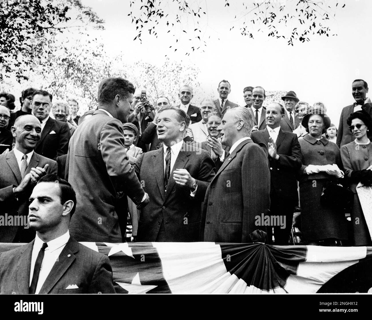 New York Gov. Nelson A. Rockefeller, center, greets U.S. President John ...