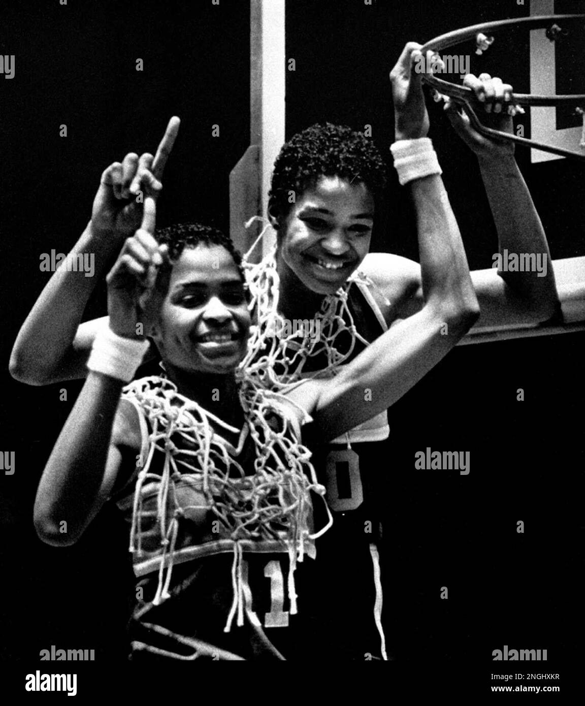 University of Southern Carolina twins Paula, left, and Pam McGee flash ...