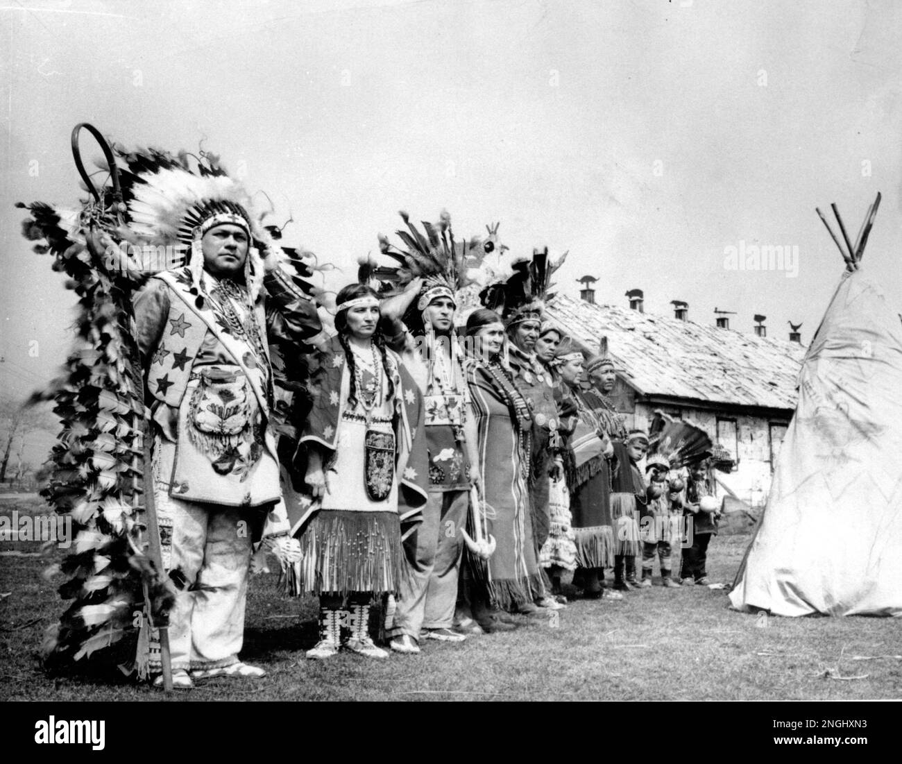 Chief Poking Fire, left, and his tribe of Iroquois Indians pose in ...