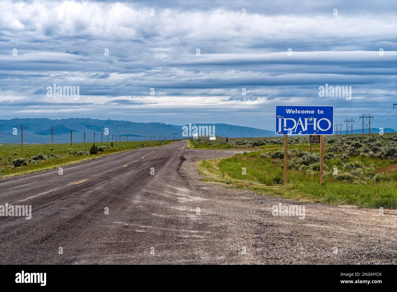 A sign welcomes travelers to the state on Highway 81 in Idaho, USA ...