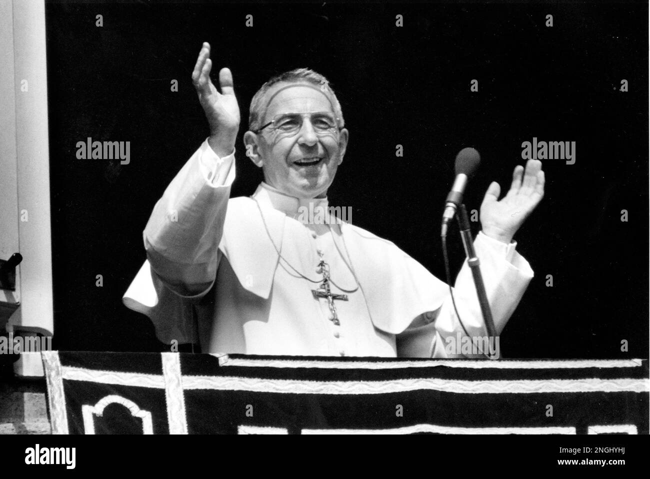 Pope John Paul I smiles at a crowd of 80,000 during a traditional noon blessing from his studio ...