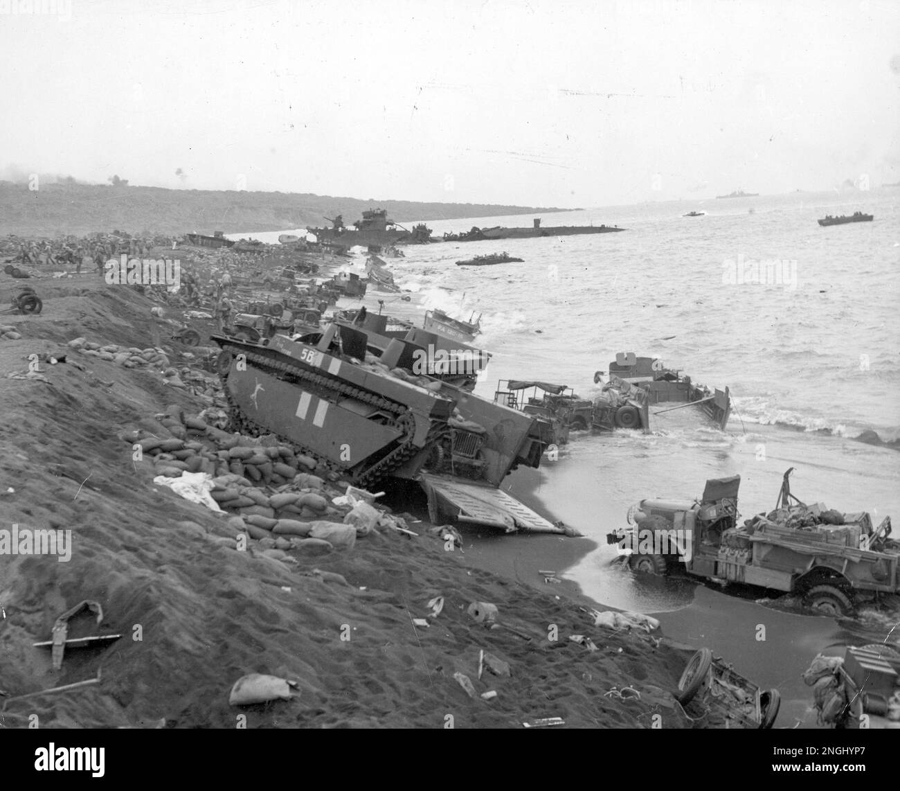 This is a Feb., 1945 photo of U.S. Marine Corps amtracs and trucks ...