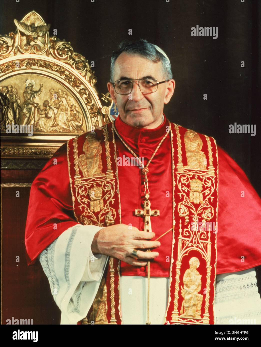This is a 1978 photo of Pope John Paul I standing before the papal throne in Vatican City ...