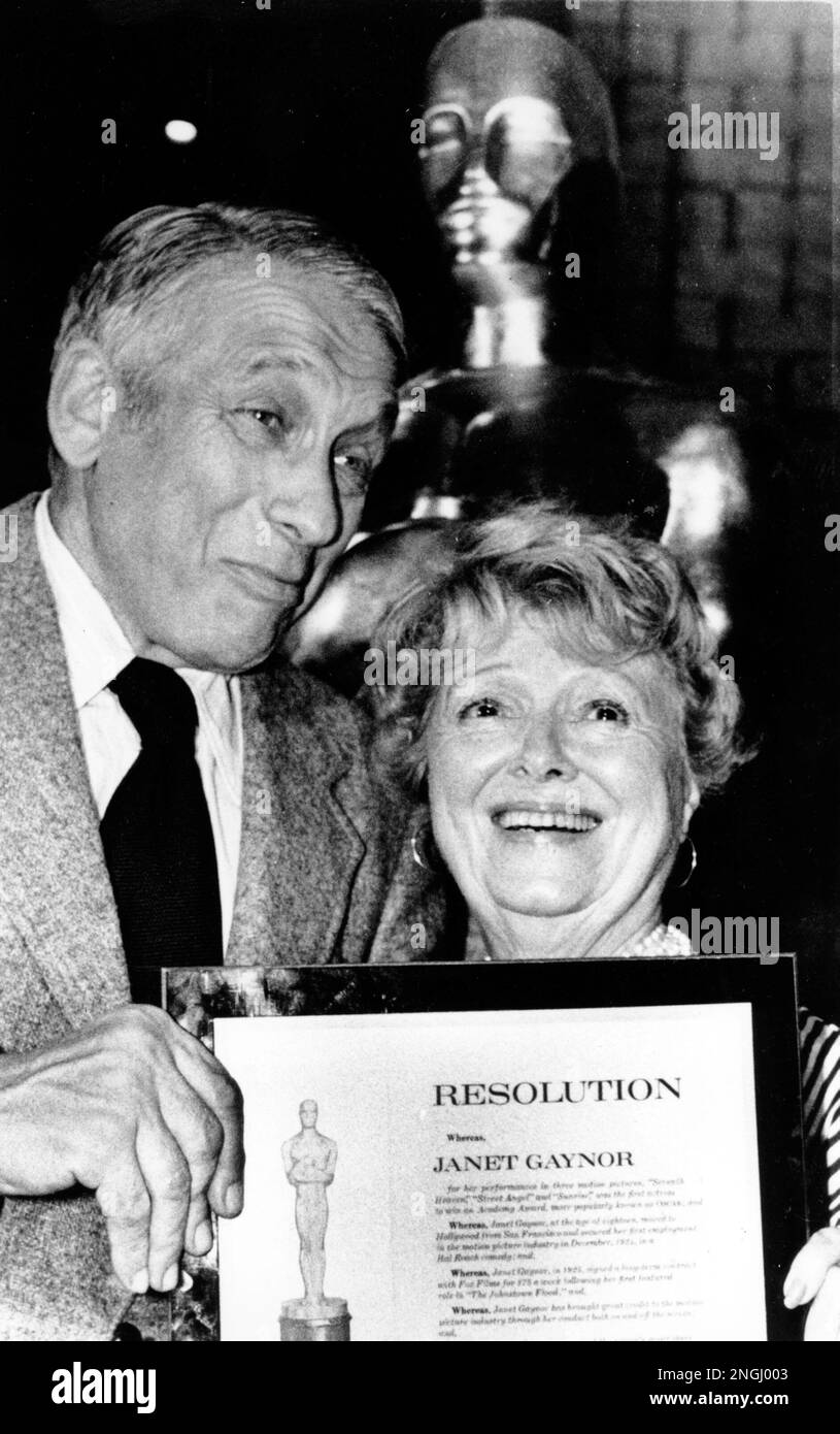 Actress Janet Gaynor poses with Howard W. Koch, president of the ...