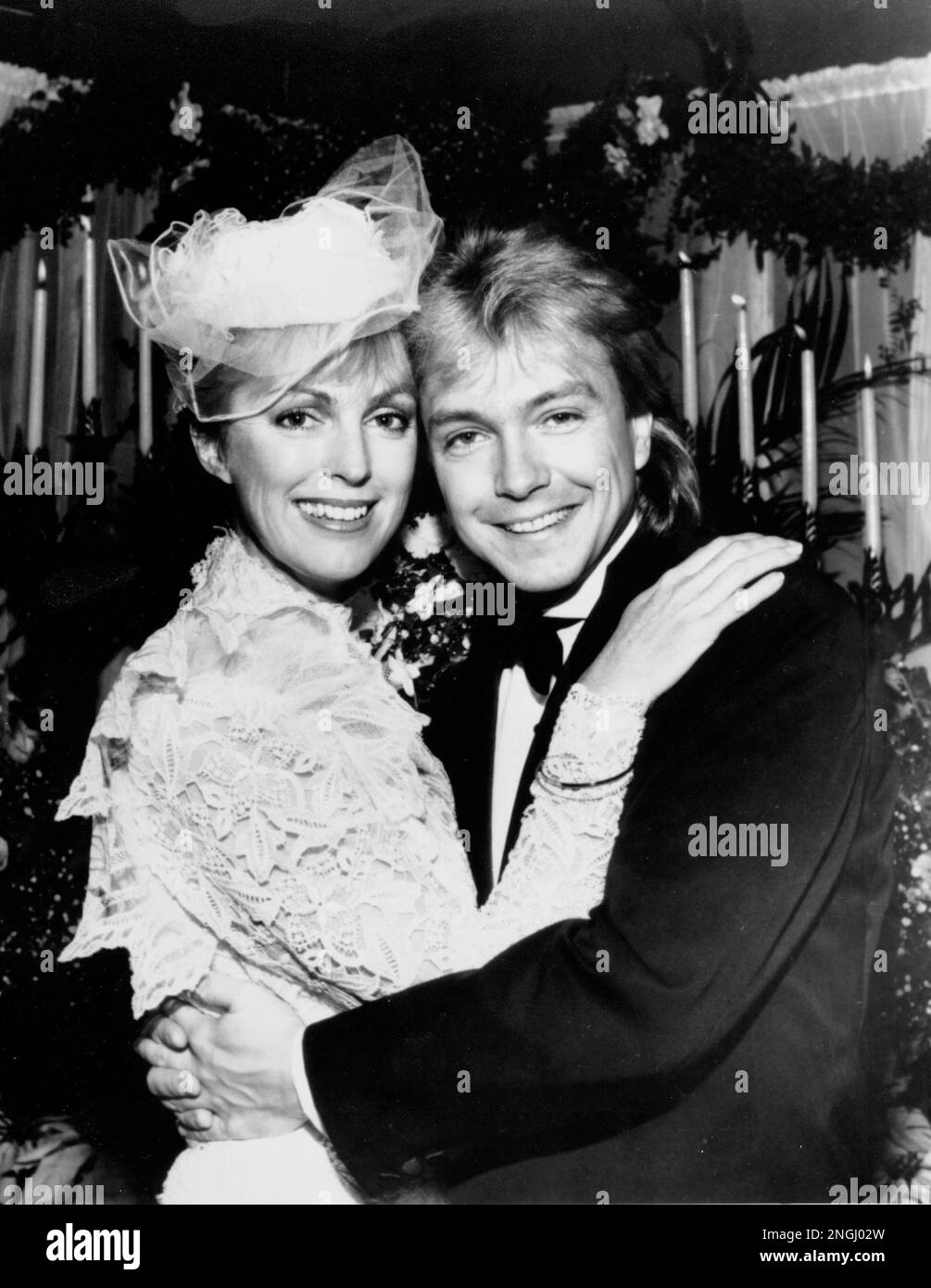 Actor and singer David Cassidy embraces his new bride Meryl Tanz in ...