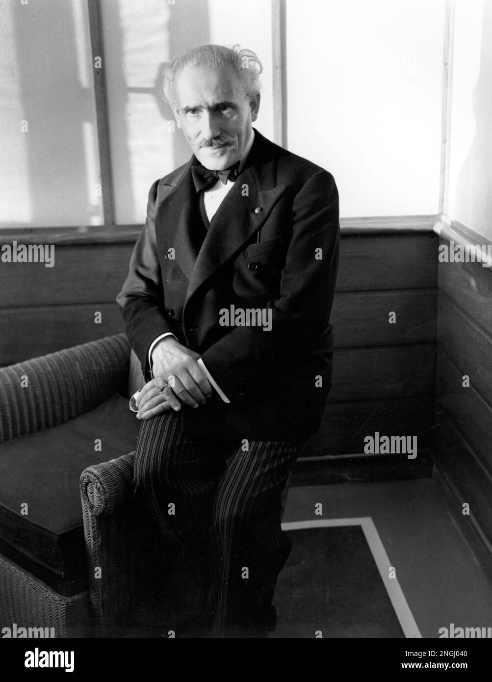 Italian orchestral conductor Arturo Toscanini poses aboard the ocean ...
