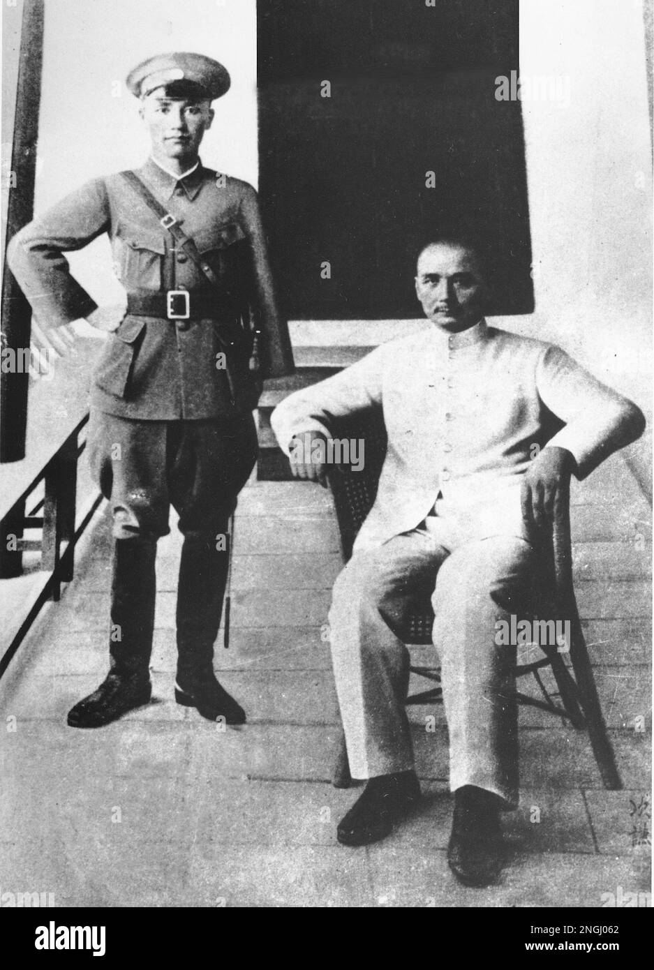 Chiang Kai-Shek, 37, standing in a formal photograph with Sun Yat-Sen ...