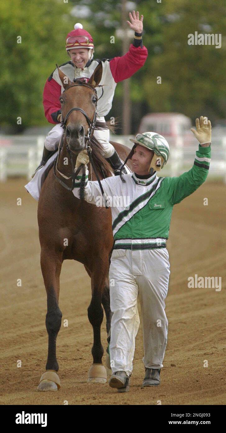 Hall of Fame jockey Julie Krone celebrates aboard trotter Moni Maker ...