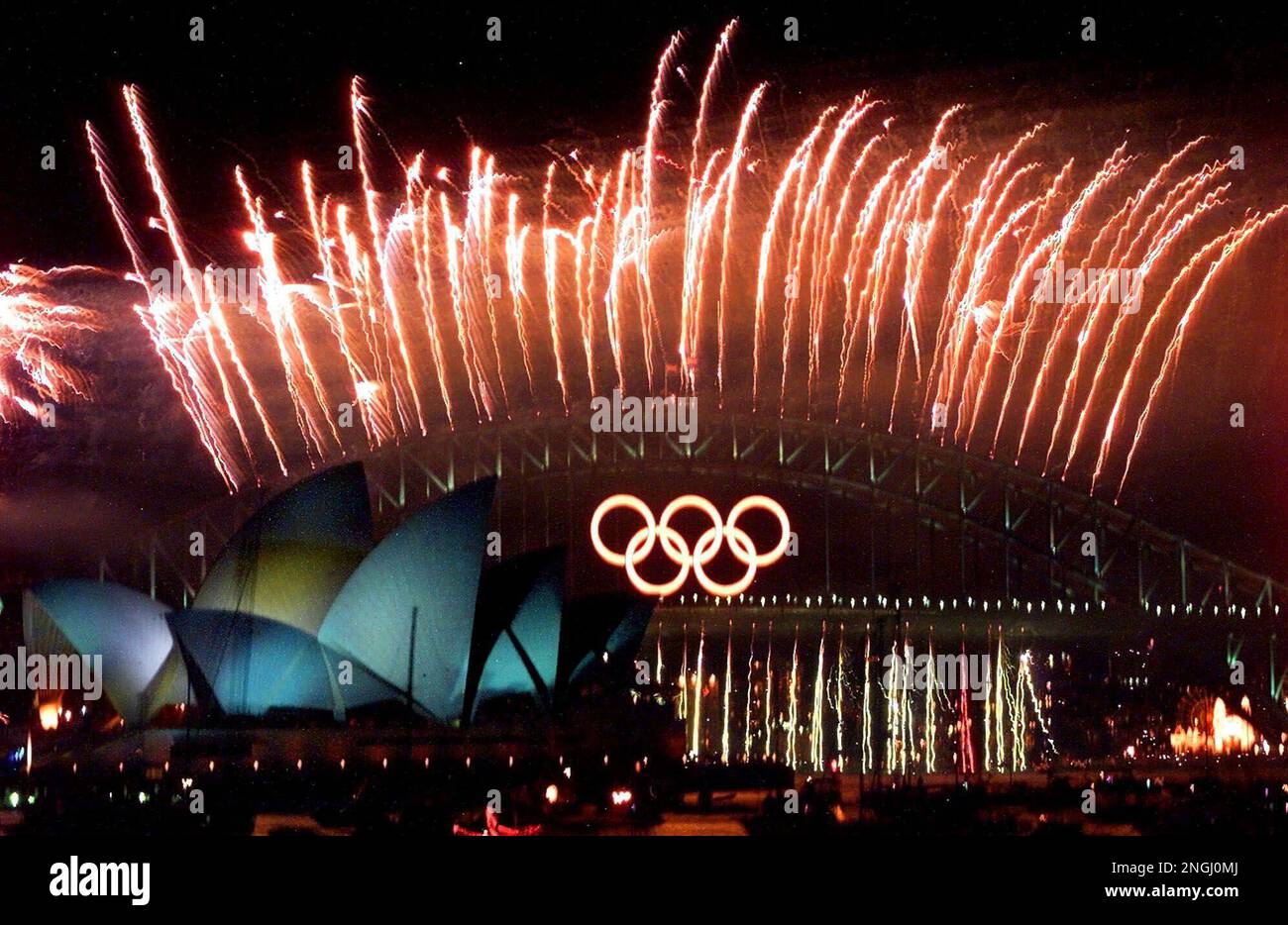 Fireworks trace skyward off the Sydney Harbor Bridge as part of the ...