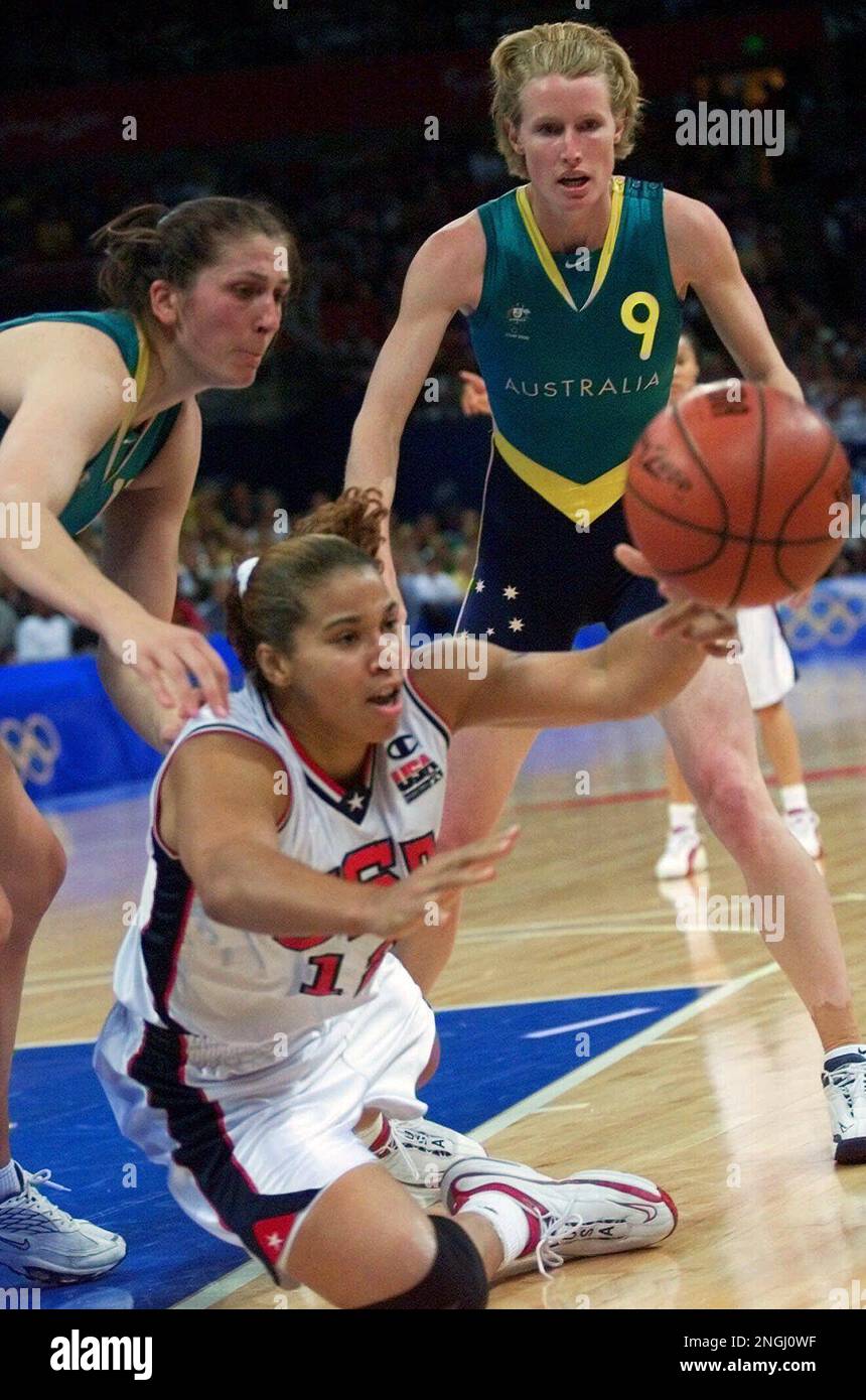 USA's Natalie Williams tries to gain control of the ball as Australia's ...