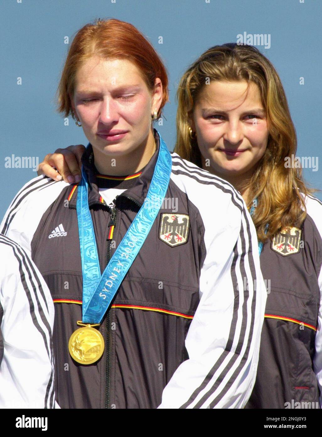 Manuela Mucke of Germany's K4 team consoles Katrin Wagner during the ...