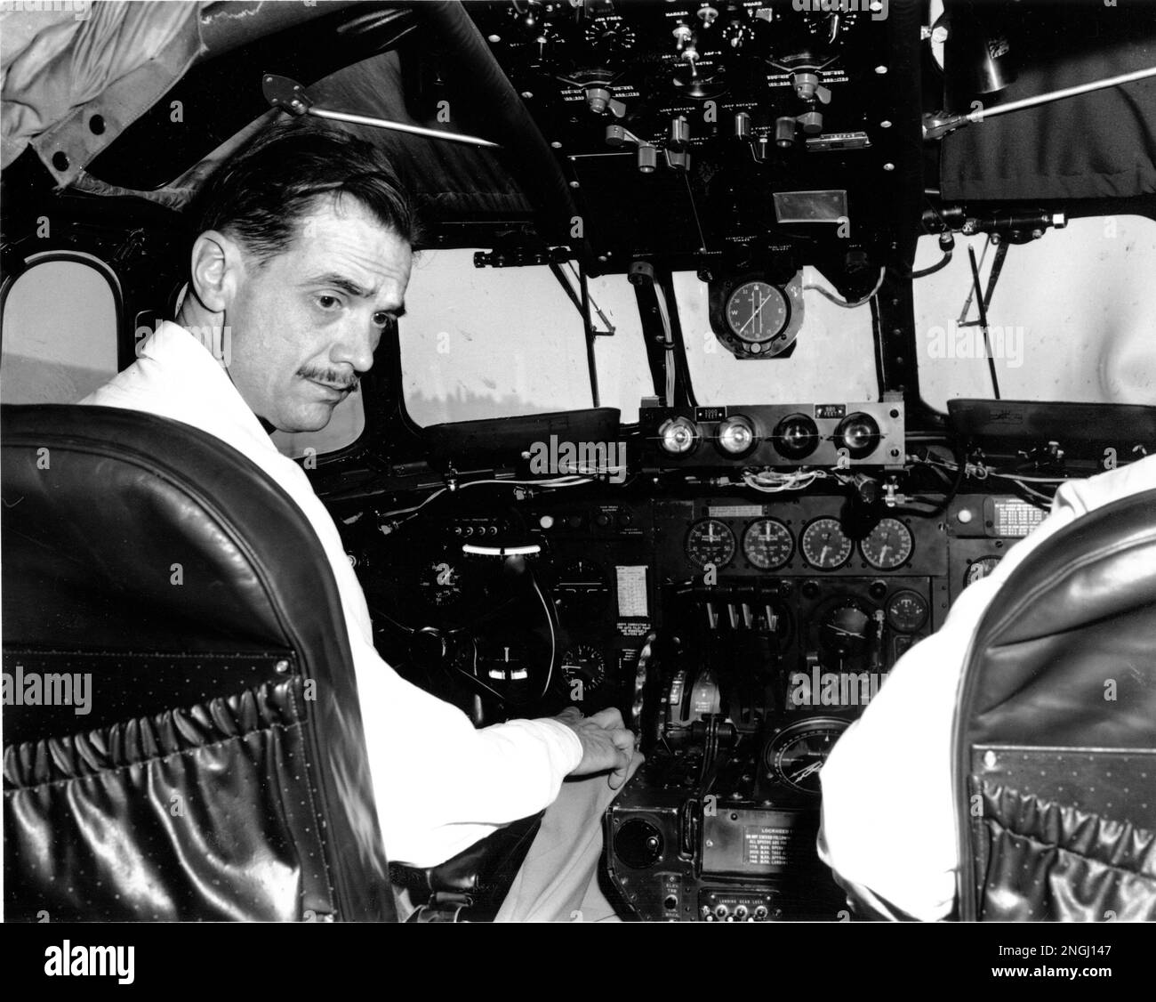Aviation and movie magnate Howard Hughes demonstrates a new radar ...