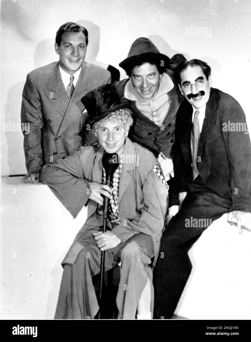 This is a 1933 photo of the Marx Brothers. Left to right, Zeppo, Harpo ...