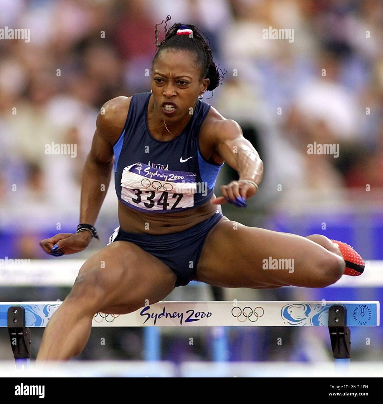 U.S. hurdler Gail Devers clears a hurdle in the first semifinal of the ...