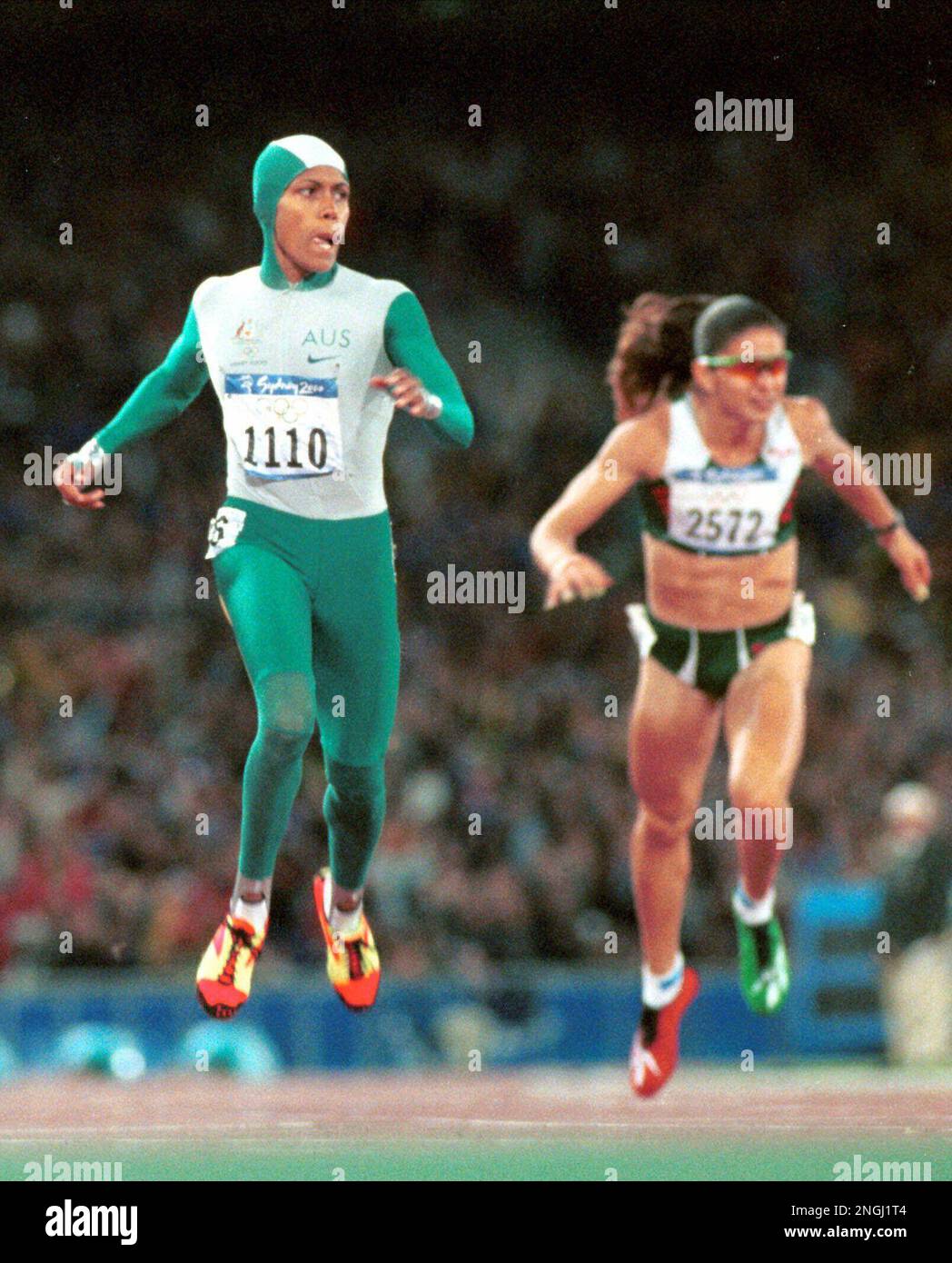 Australia's Cathy Freeman crosses the finish line to win the gold medal ...