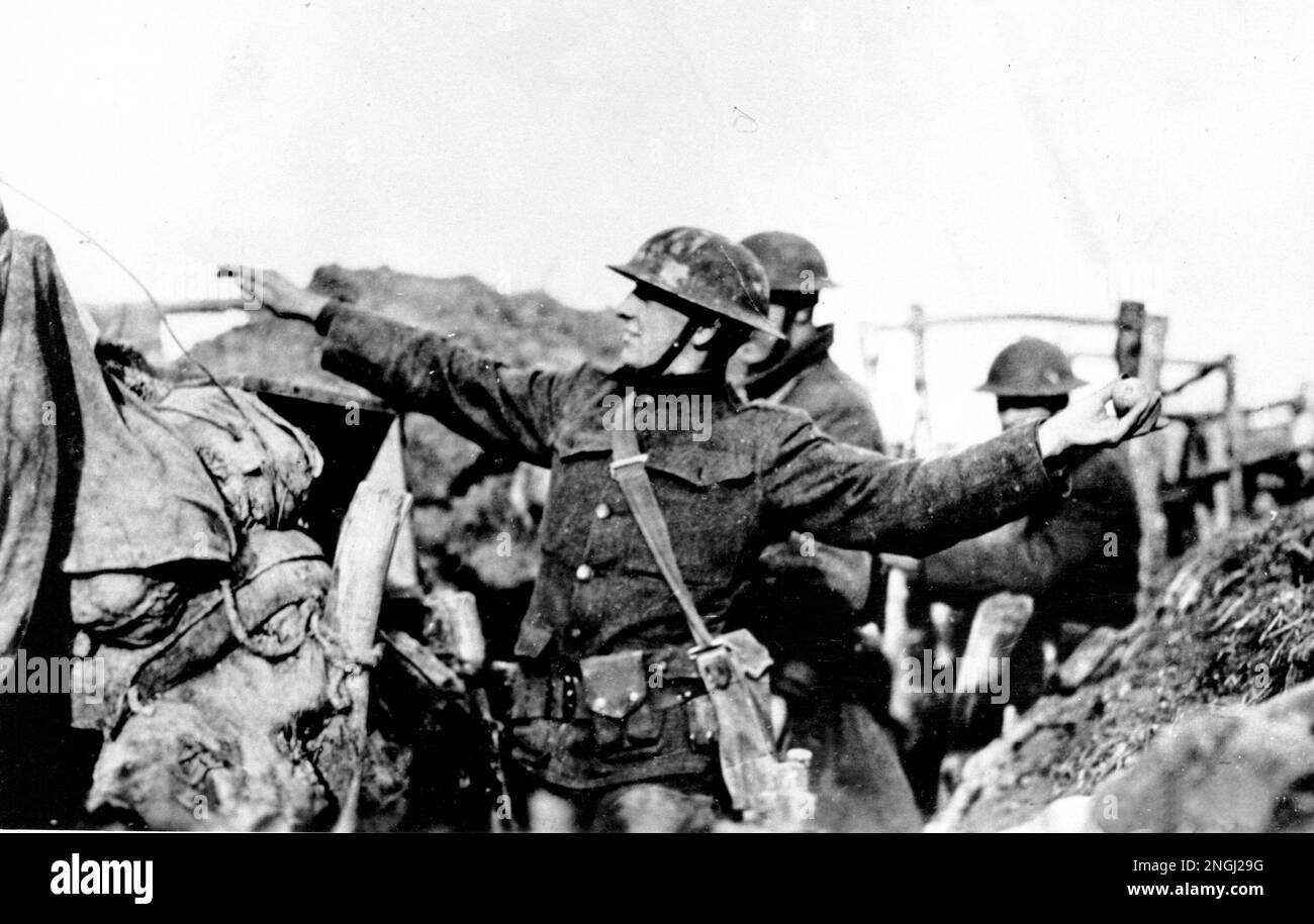 An American doughboy from the First Division throws a hand grenade in ...