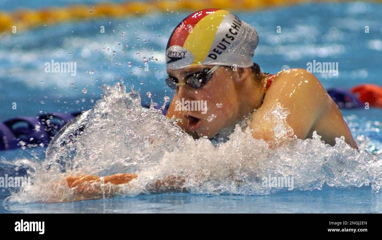 German swimmer Ina Hueging competes in a heat of the women's 200m ...