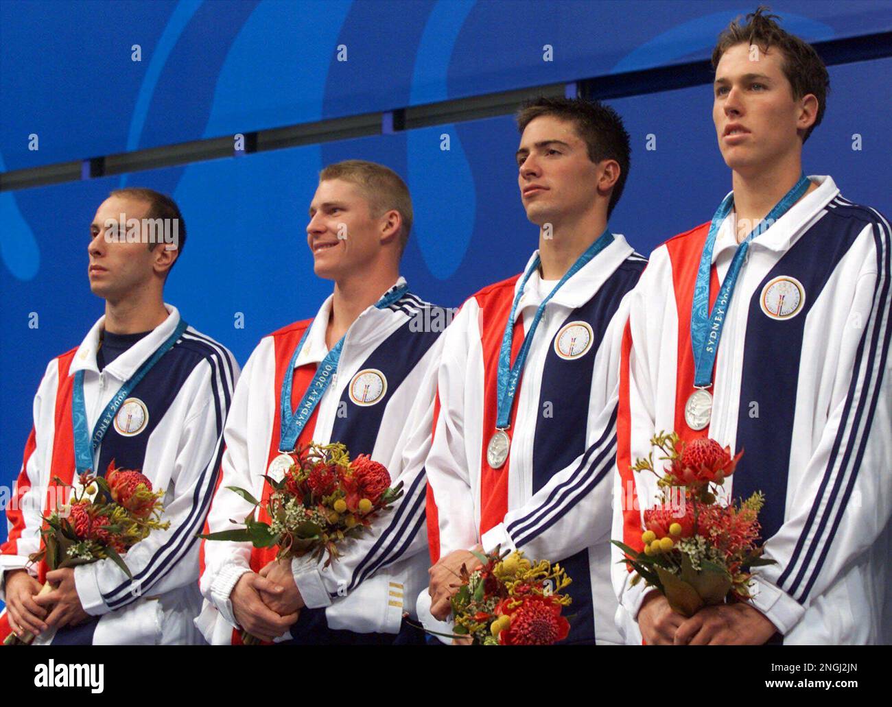 The U.S. men's 4x200 relay team recieve their silver medals during the ...