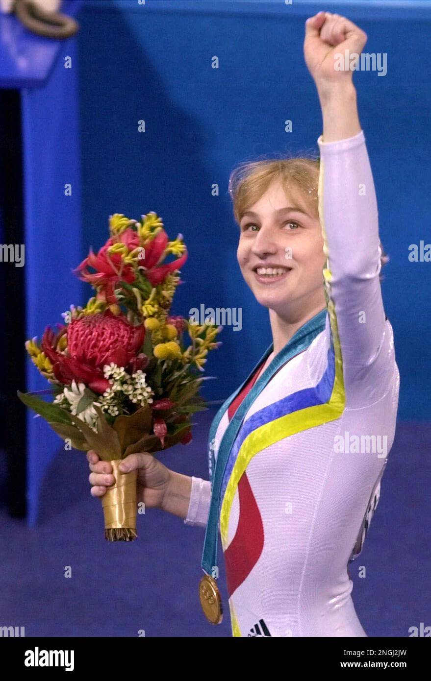 Gold medalist Simona Amanar of Romania waves to the crowd after the ...