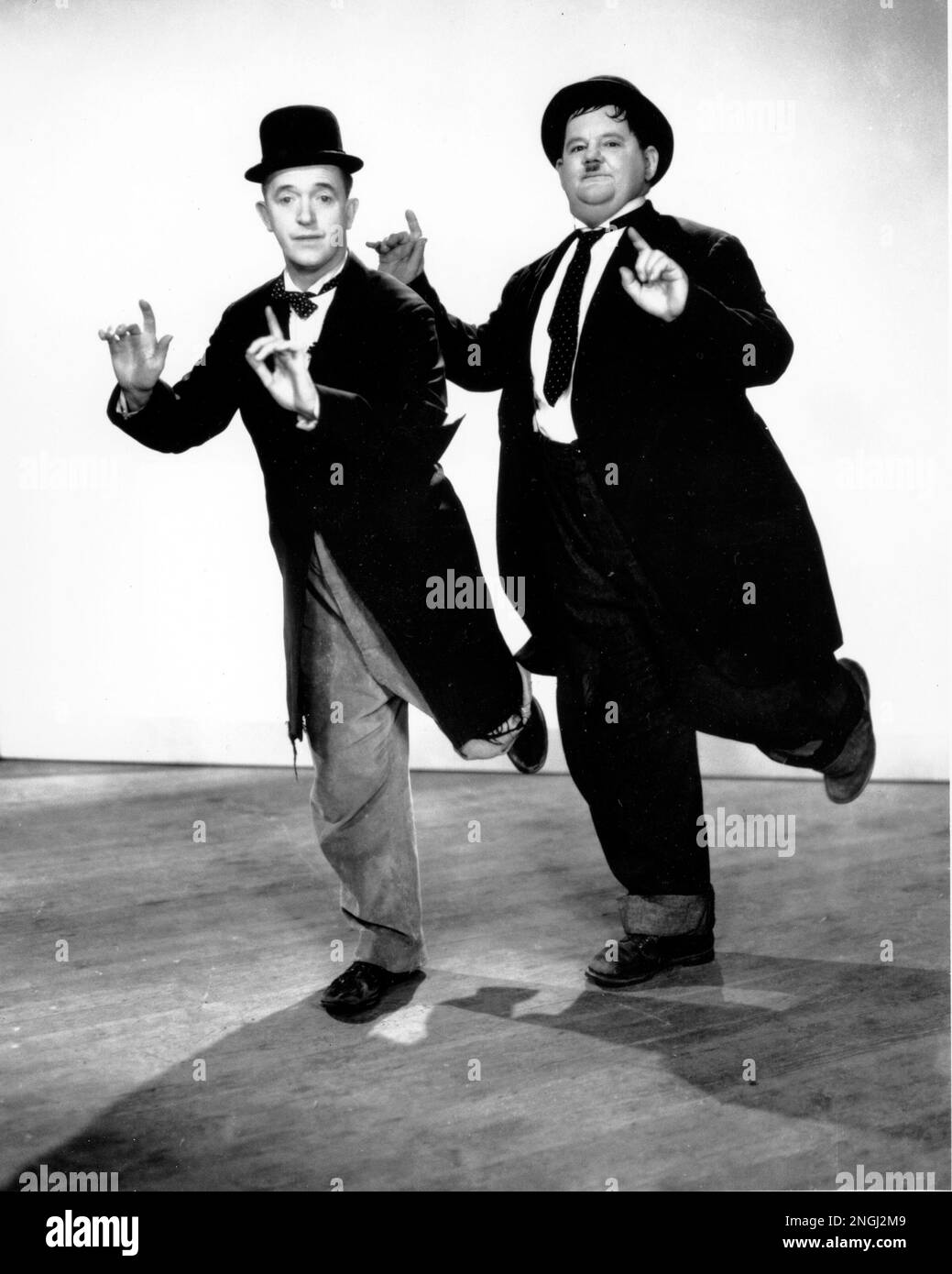 This is a 1936 photo of comedic actors Stan Laurel and Oliver Hardy ...