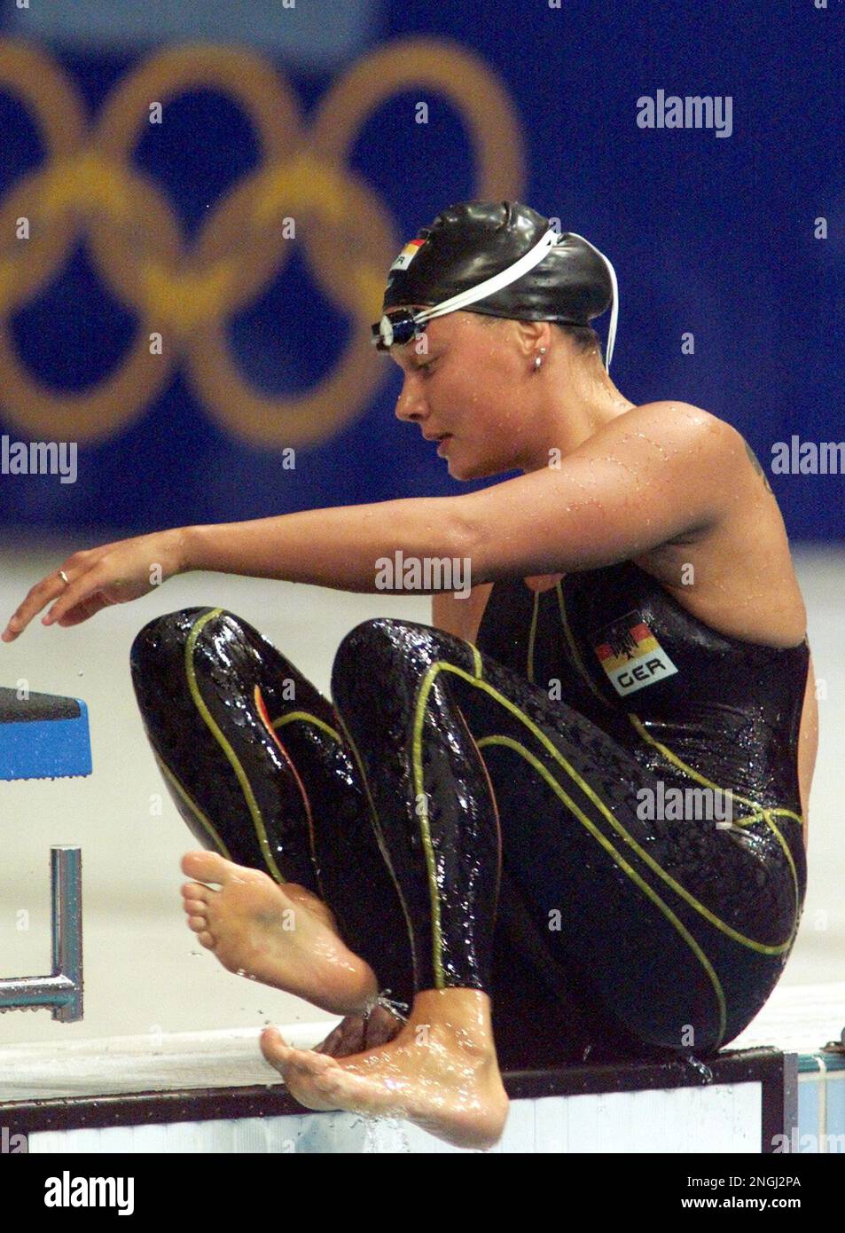 German swimmer Franziska van Almsick rests after competing in a heat of ...