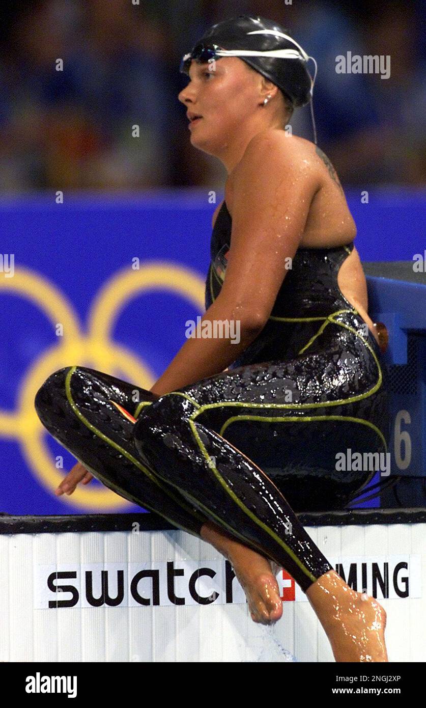 German swimmer Franziska van Almsick rests after competing in a heat of ...
