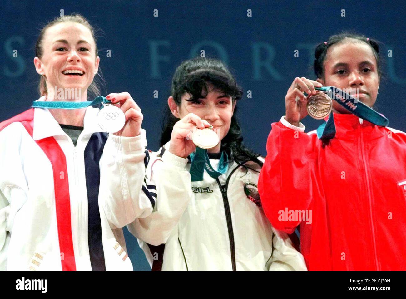 Bulgaria's Izabela Dragneva, center, shows her gold medal with silver ...
