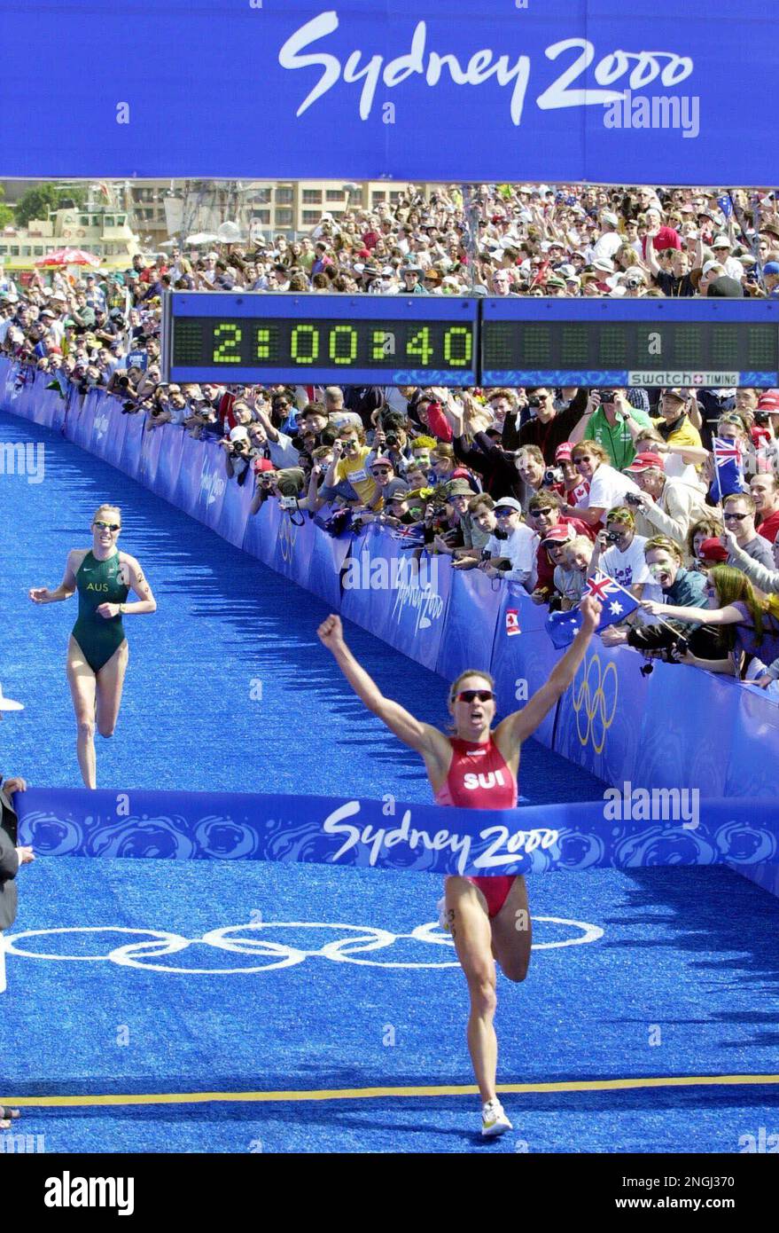 Winner of the women's Olympic triathlon Brigitte McMahon of Switzerland ...