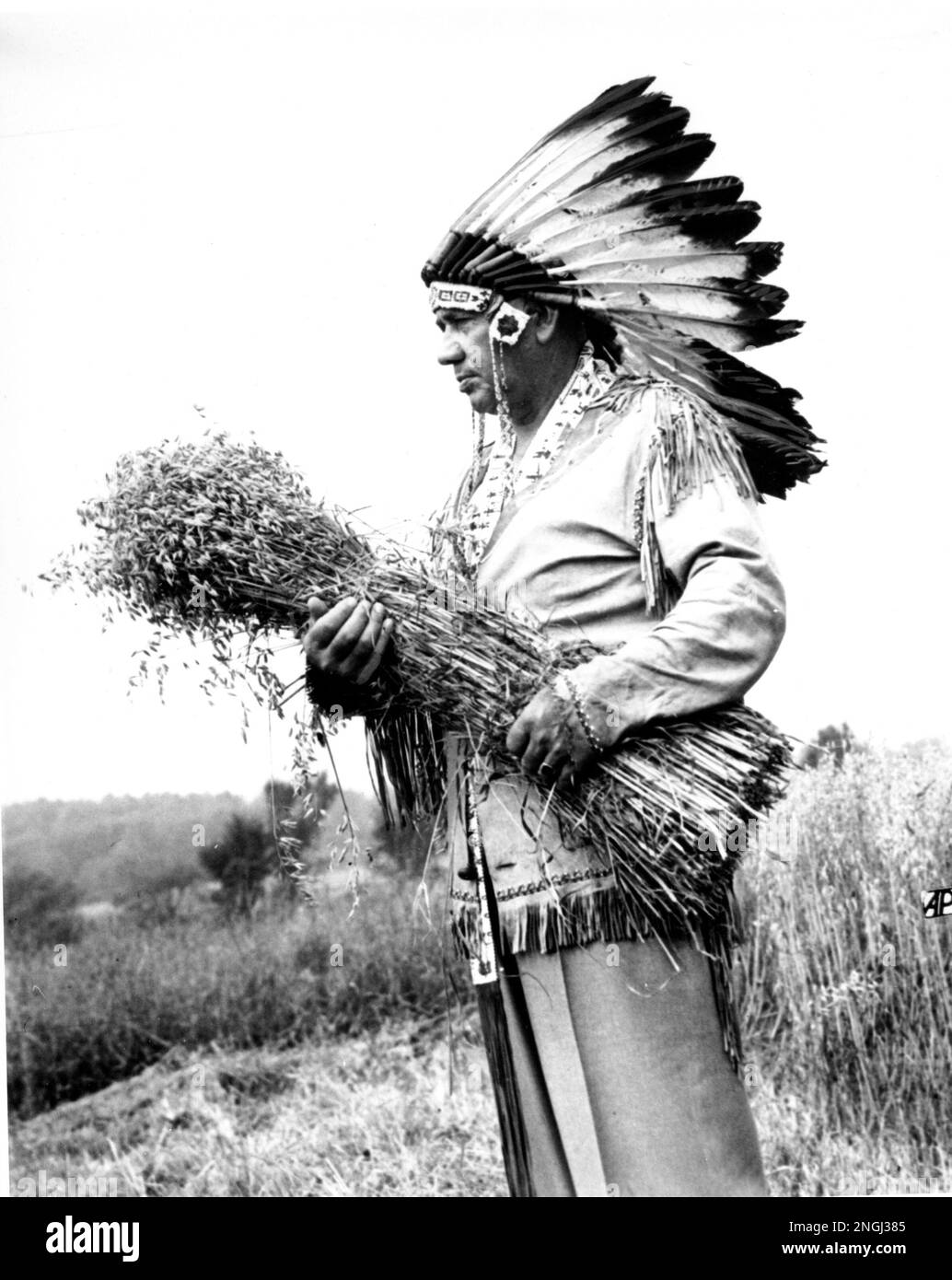 A Mohawk Indian of the St. Regis reservation in New York gives his ...