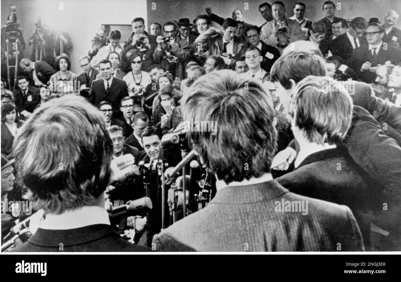 The Beatles face the media on arrival at JFK airport in New York City ...