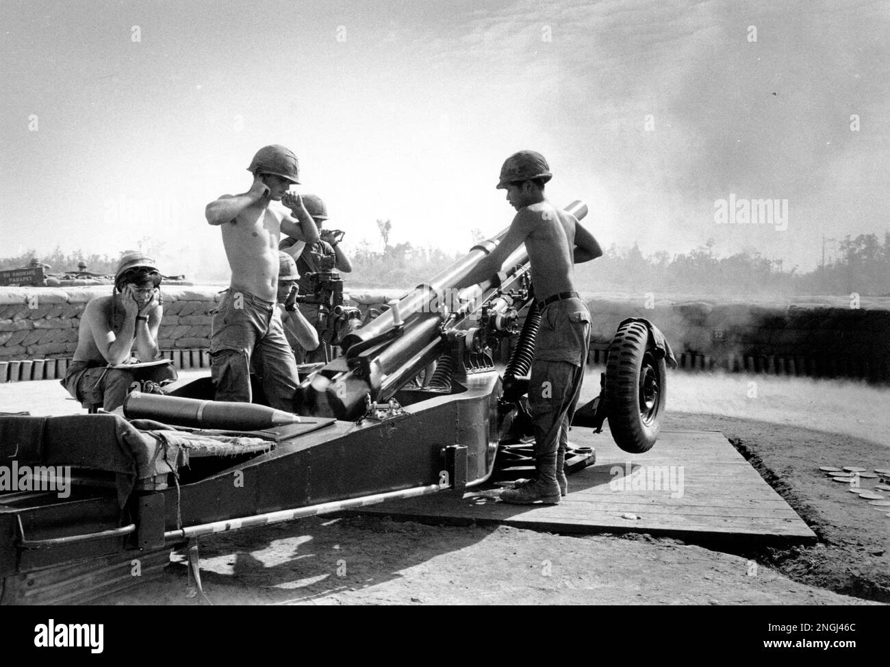 An artillery unit of the First Air Cavalry Division fires a cannon on ...