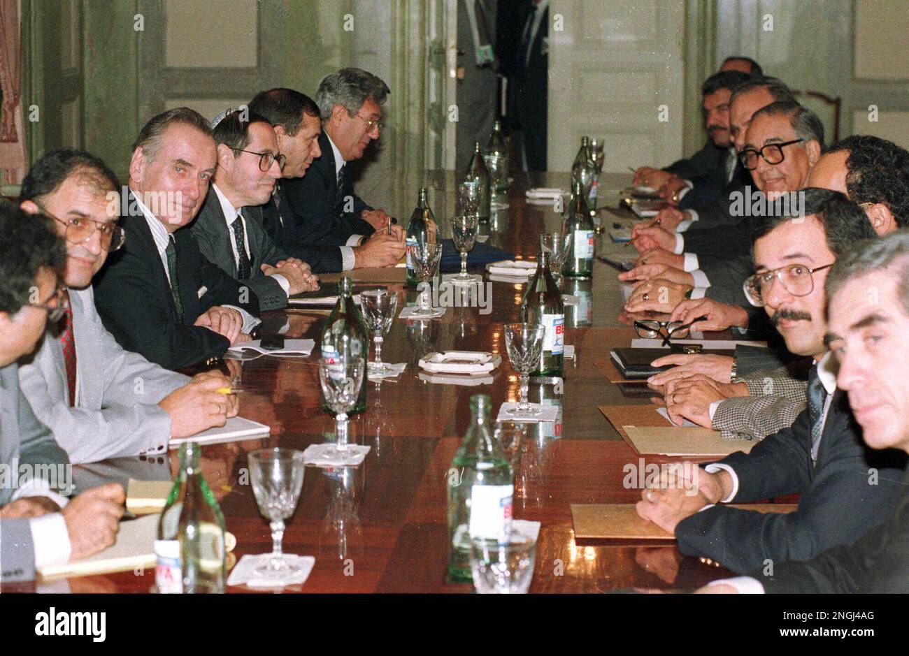 Israeli negotiators, left, and the Palestinian-Jordanian delegation ...