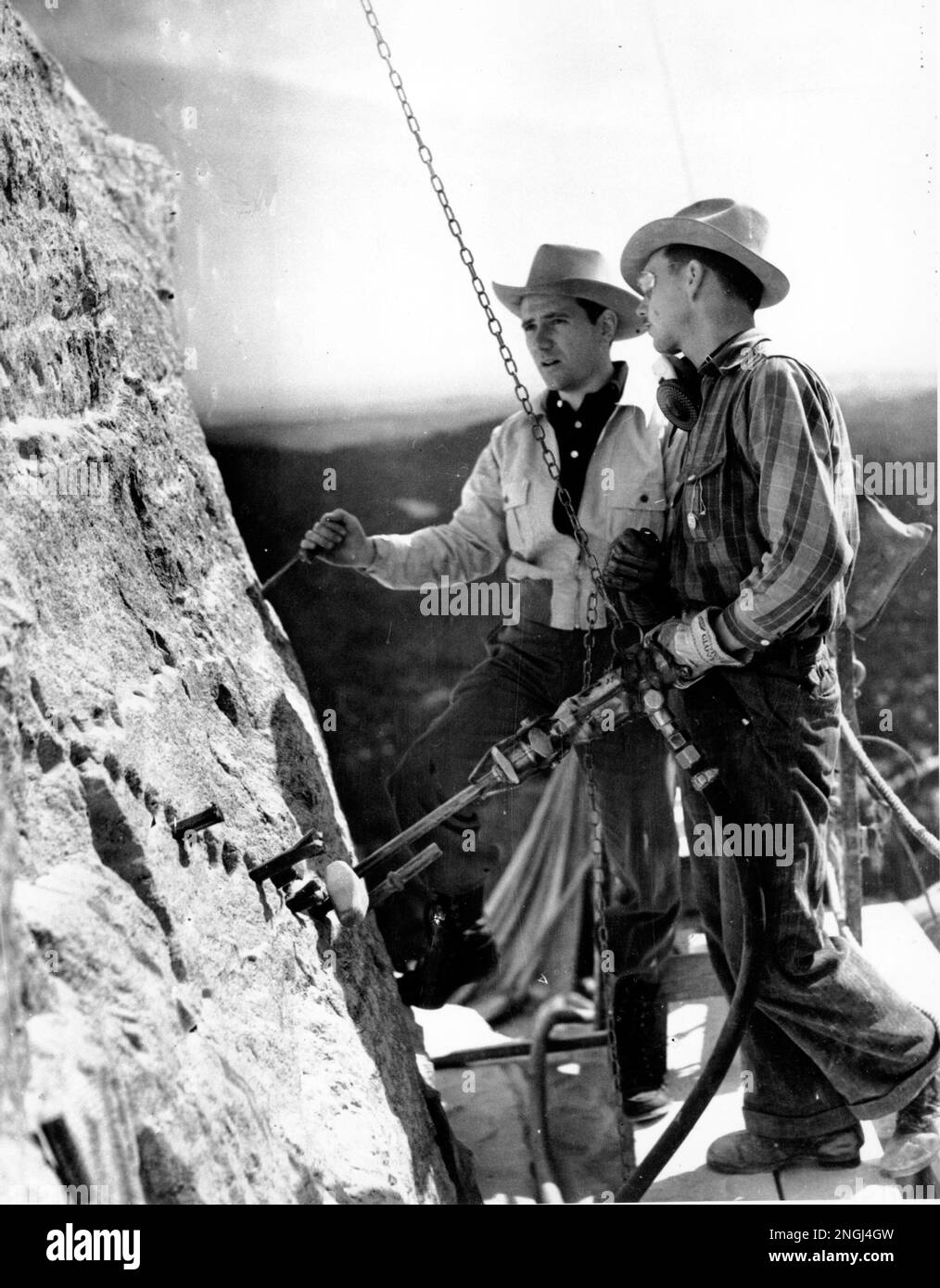 Lincoln Borglum, left, directs driller "Happy" Anderson as Anderson ...
