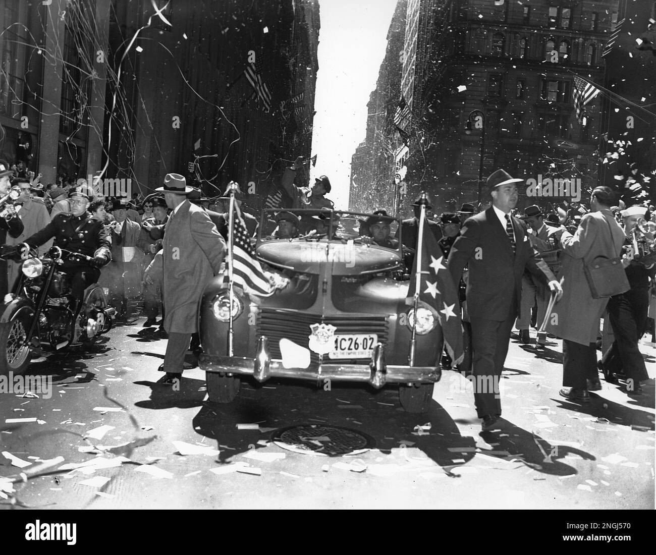 Paper Continues To Shower On Gen Douglas Macarthur As He Stands In An