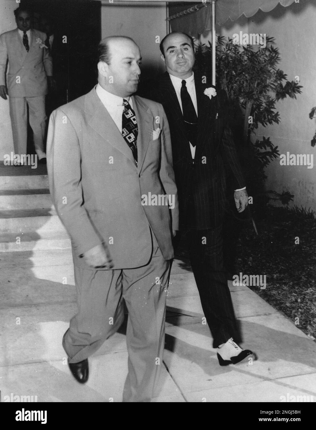 Al Capone, right, is shown in one of his last public appearances as he ...