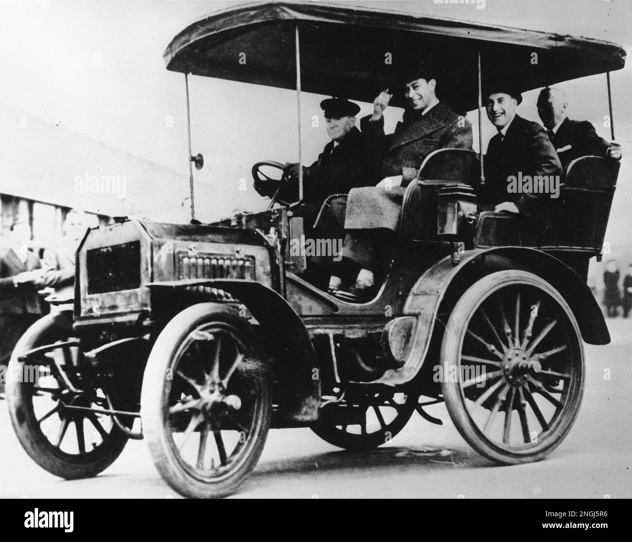 King George VI, grandson of King Edward VII, is shown taking a ride in ...