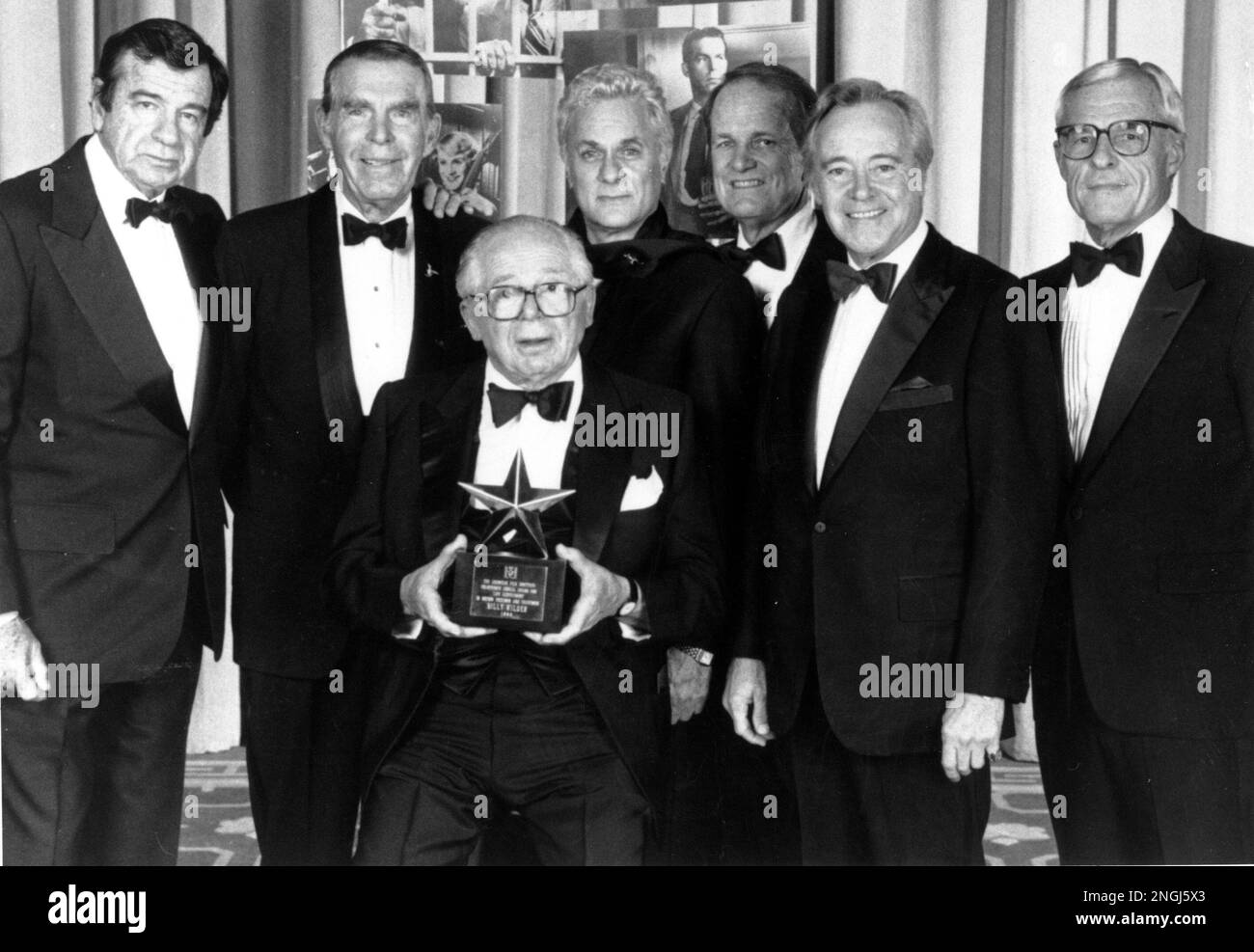 Director, producer, and writer Billy Wilder is seen holding his ...