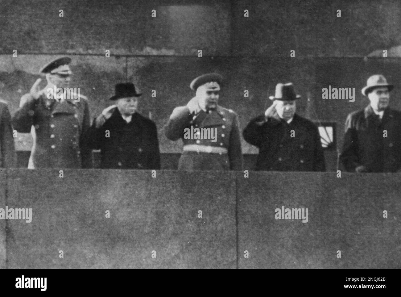 Soviet leaders are shown saluting during the Russian Army Parade as ...
