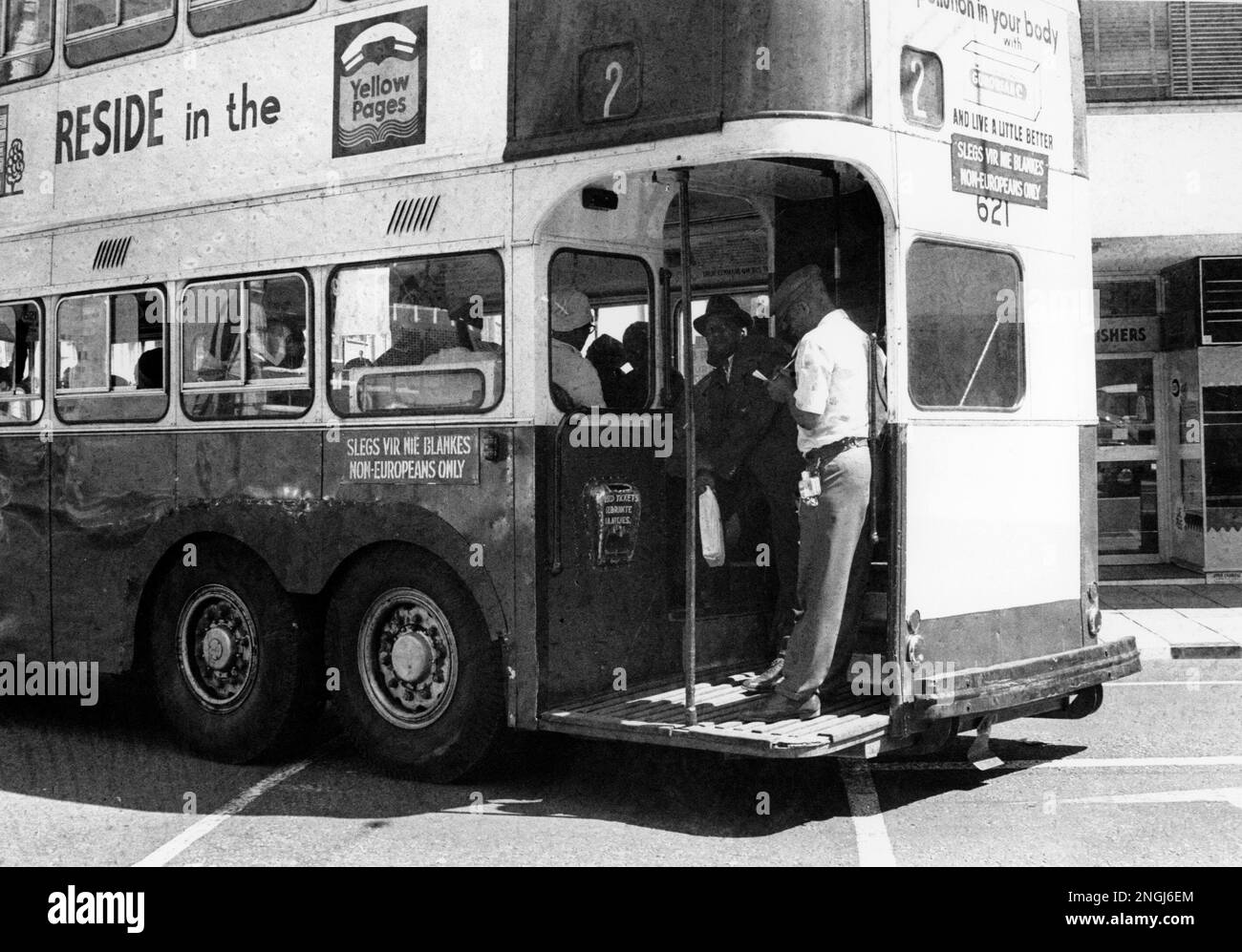 This is a photo of a doubledeck bus marked "Slegs vir nie Blankes," or ...