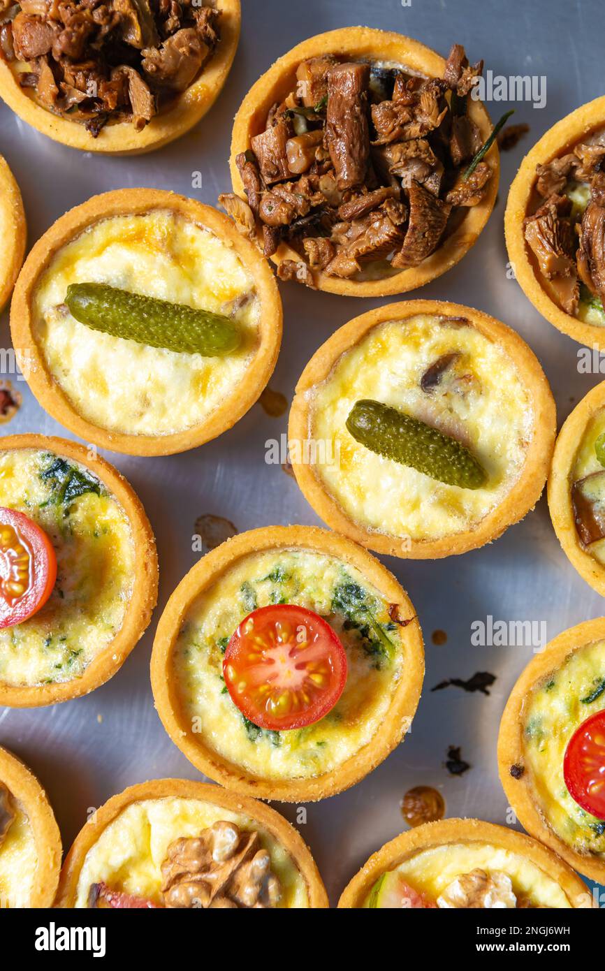 Delicious canape snacks cooked in bakery for party. Overhead photo of ...