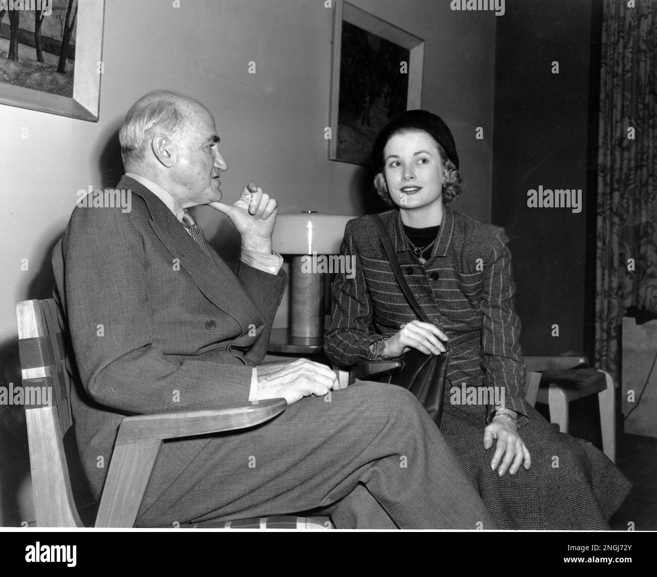 Movie producer Samuel Goldwyn, left, interviews actress Grace Kelly on ...