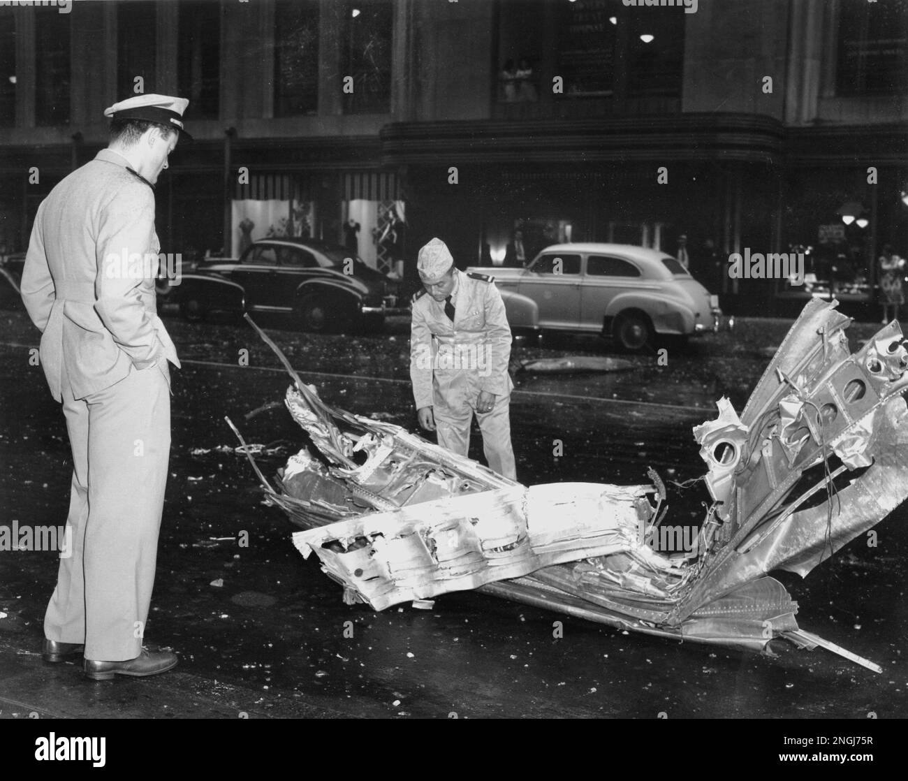 Wreckage from an army B-25 bomber accident sits on 34th Street, July 28 ...